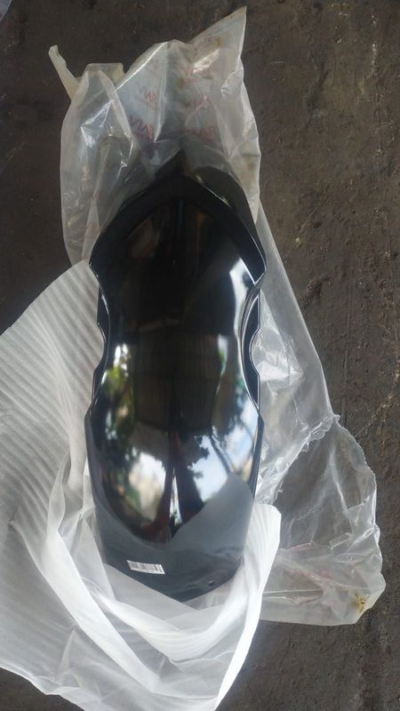 Selebor Depan Kendaraan Roda Tiga