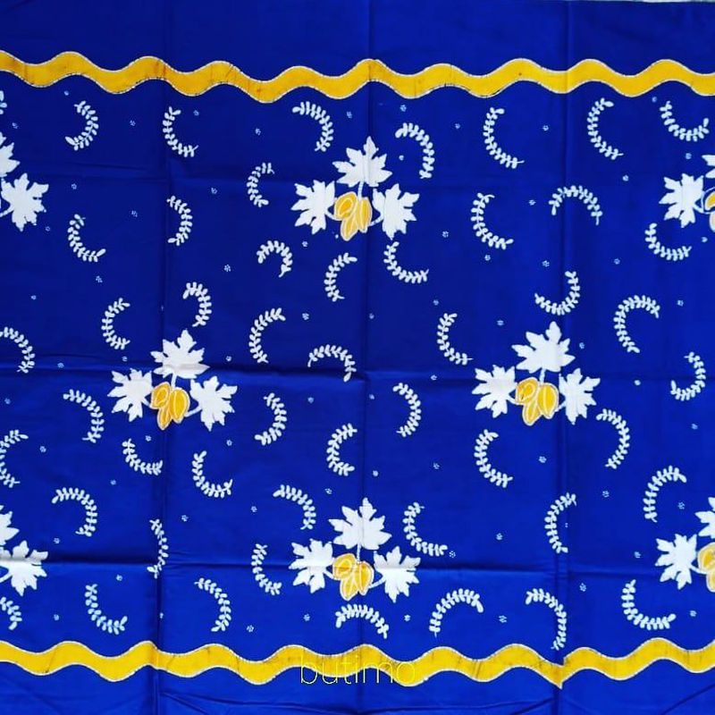 kain batik tekno dengan motif carica