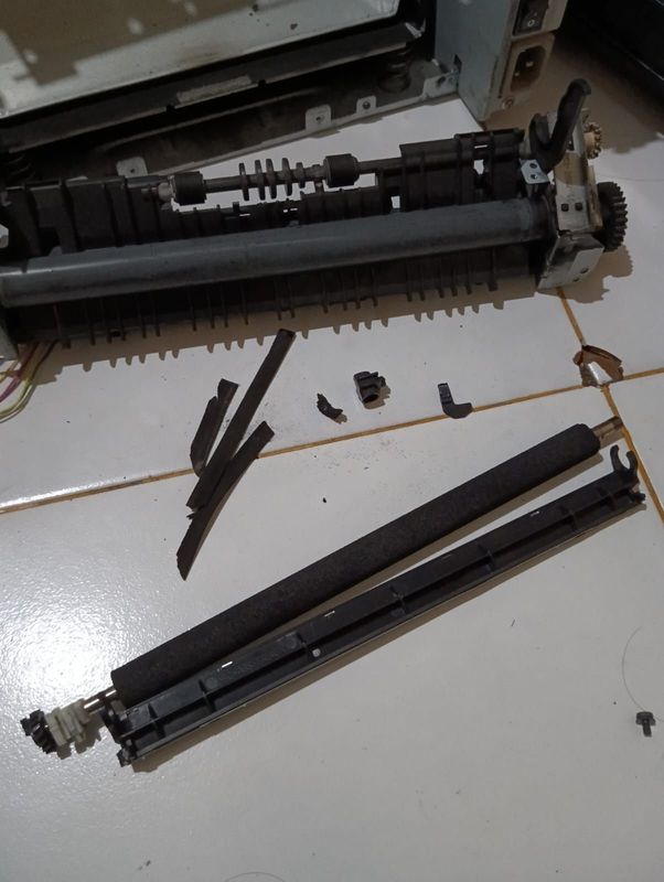 Service pergantian film printer laser