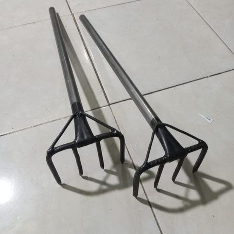 Garu dengan pati besi